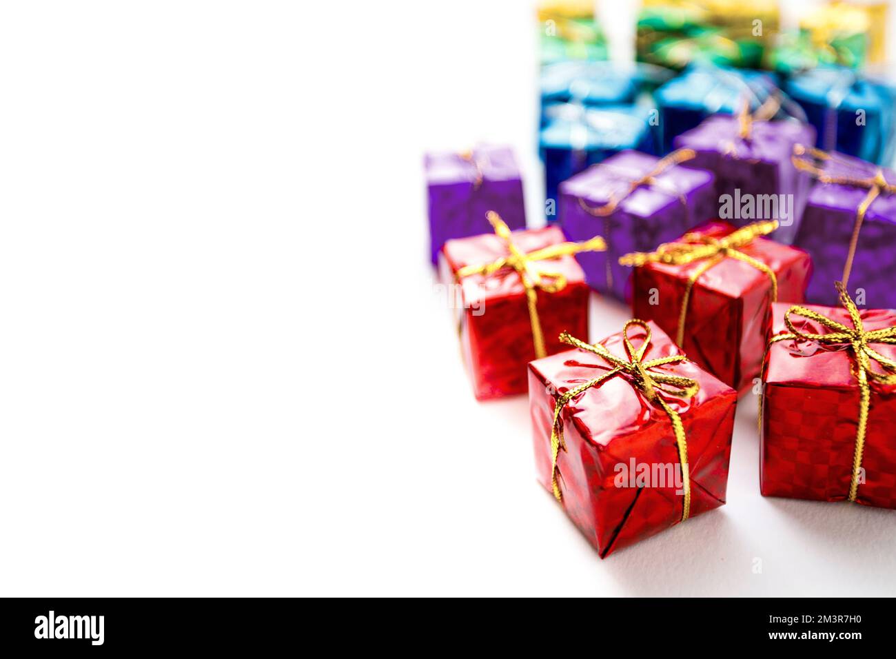 Many colorful gift boxes on white background Stock Photo - Alamy