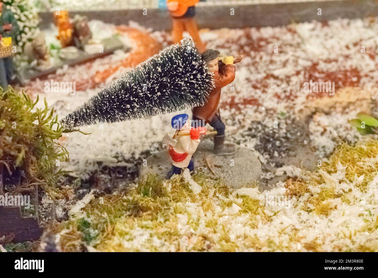 Father And Son Carying A Christmas Tree Christmas Decoration At ...