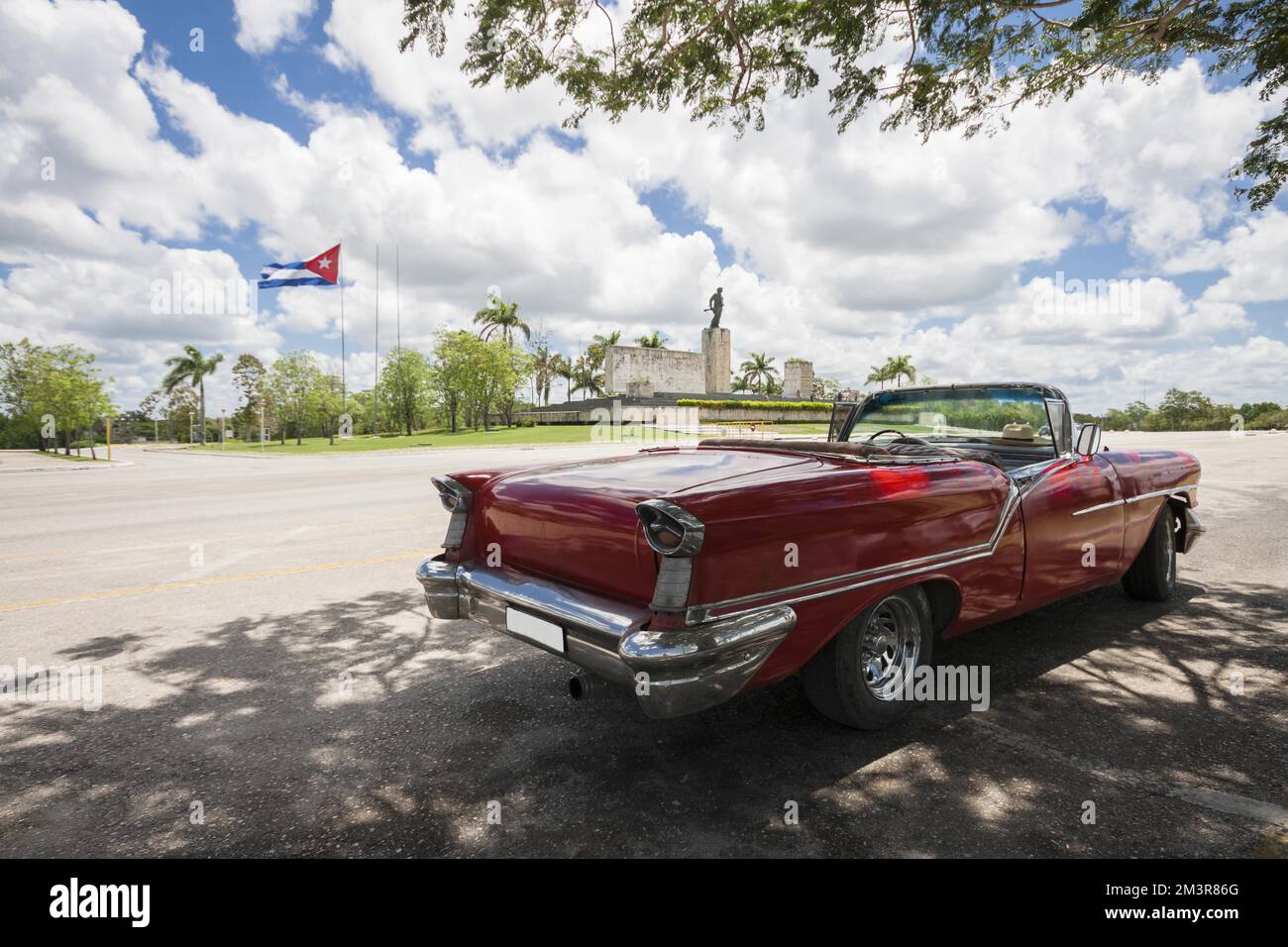 Classic convertible car with monument cuban flag background Stock Photo ...