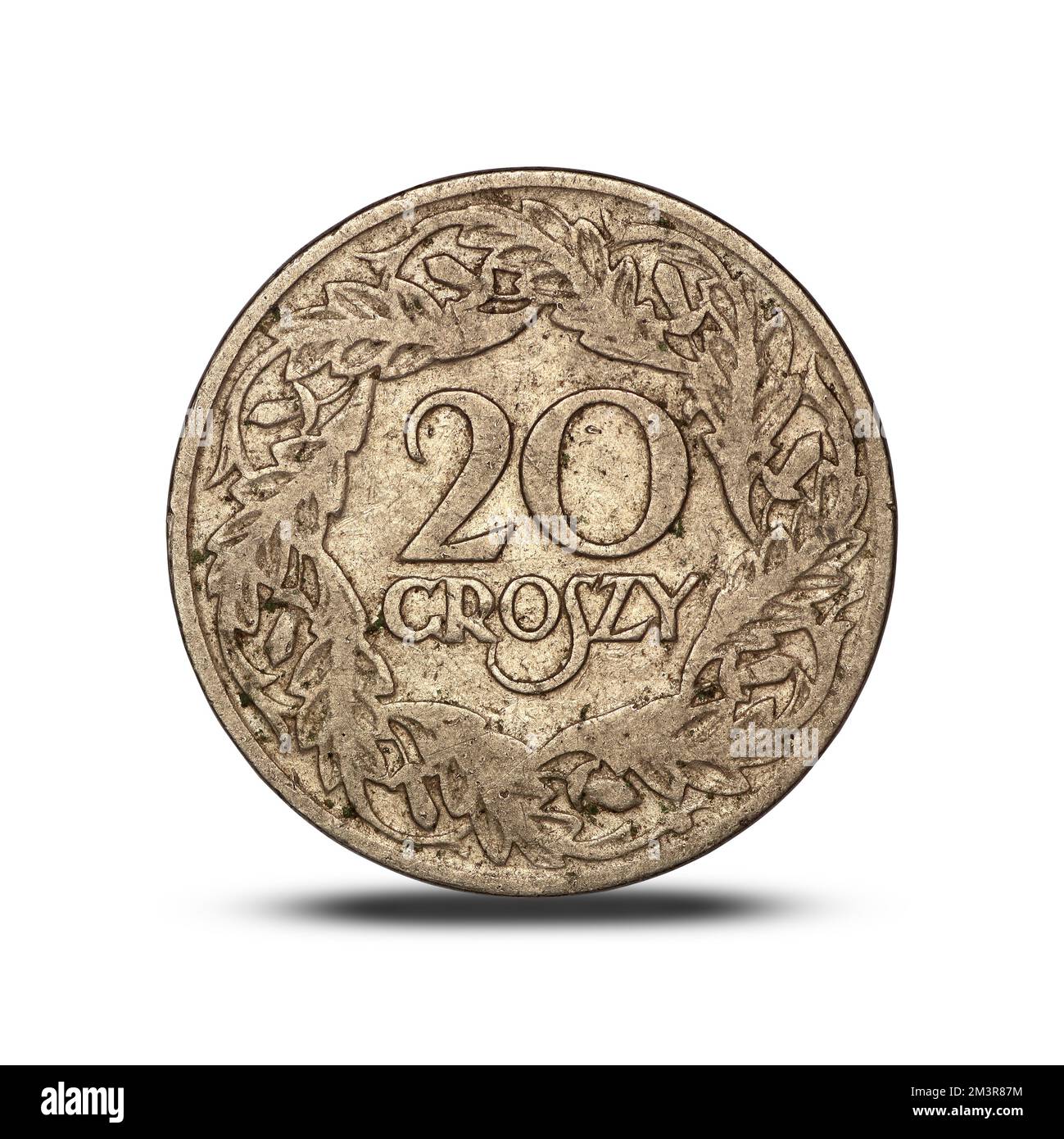 Polish interwar 20 groszy coin with an eagle on a white background ...