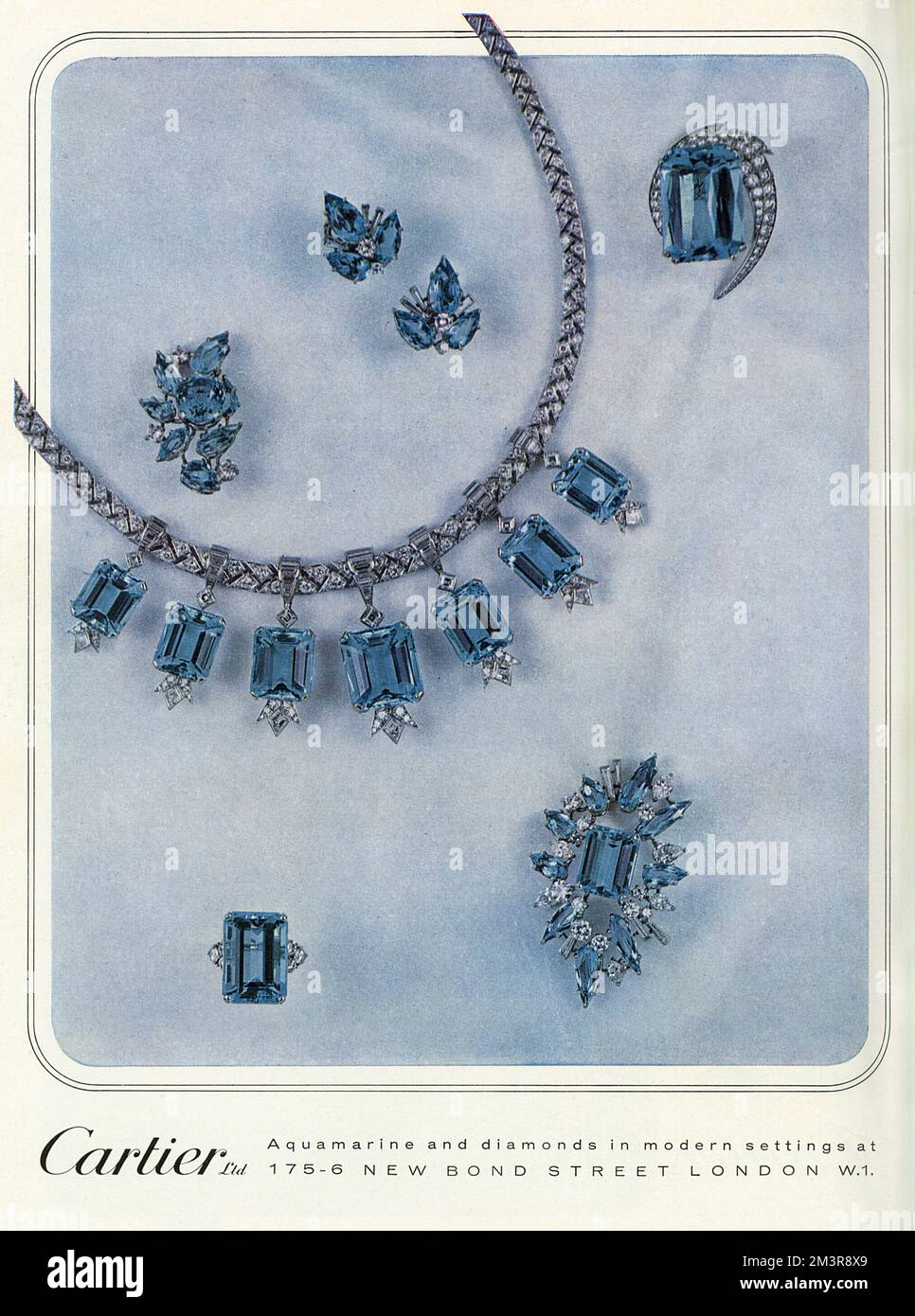 Cartier advertisement featuring aquamarine and diamond pieces in modern ...