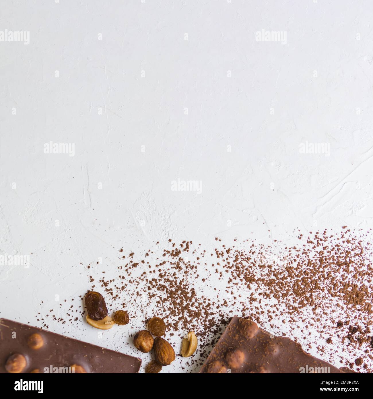 Cracked nut raising chocolate with cocoa Stock Photo - Alamy