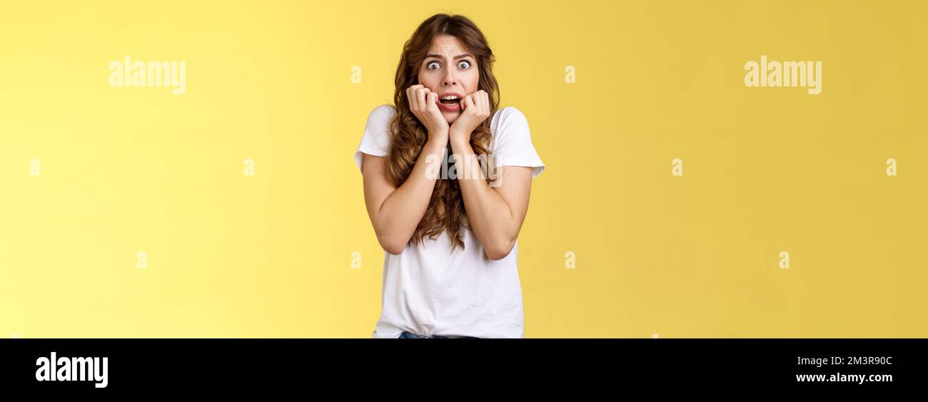 Timid insecure intense gasping young scared attractive woman sighing ...