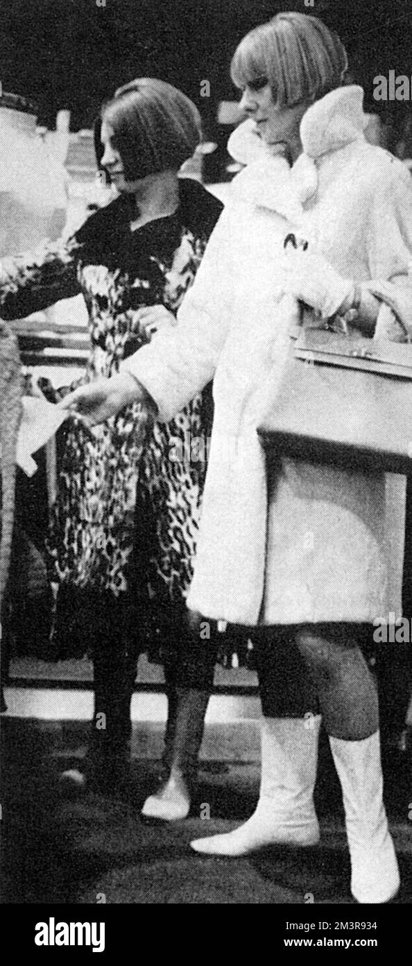 Sybil Zelker of Polly Peck shopping at Woollands Stock Photo - Alamy