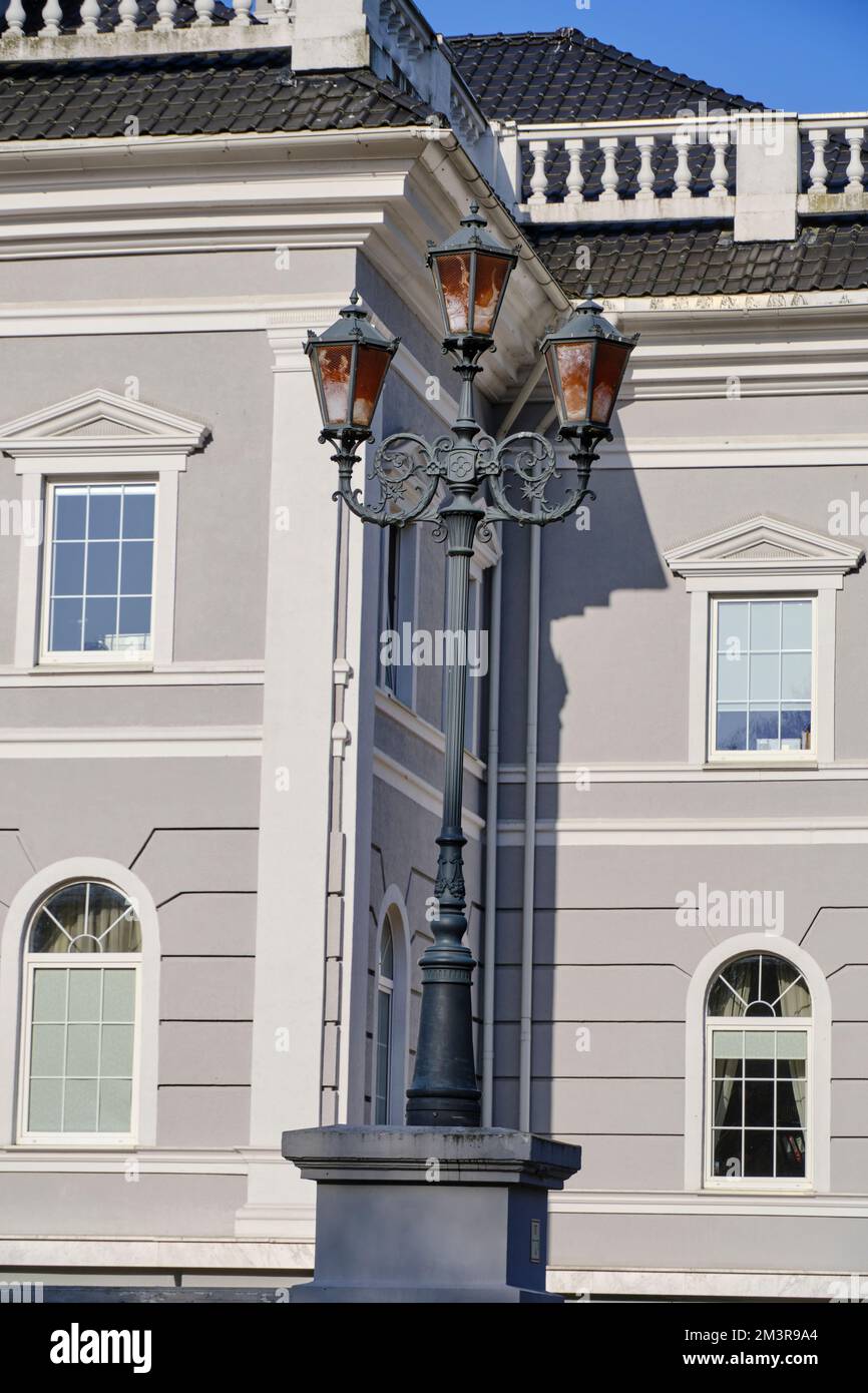 Old retro street lamp background historic building Stock Photo - Alamy