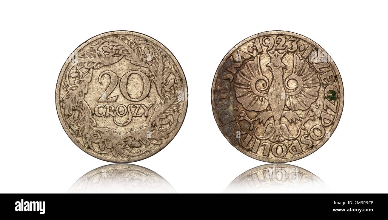 Polish interwar 20 groszy coin with an eagle on a white background ...