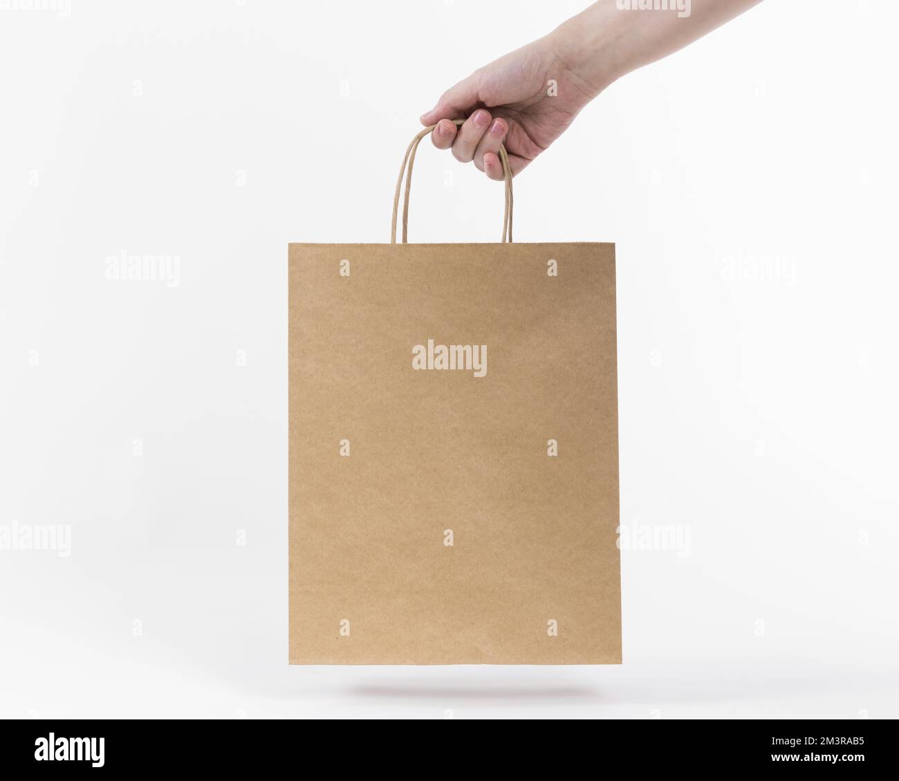 Paper shopping bag held by hand, Resolution and high quality beautiful ...