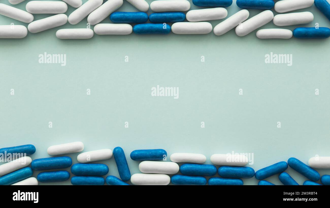 Top bottom border made with capsules candies colored backdrop ...