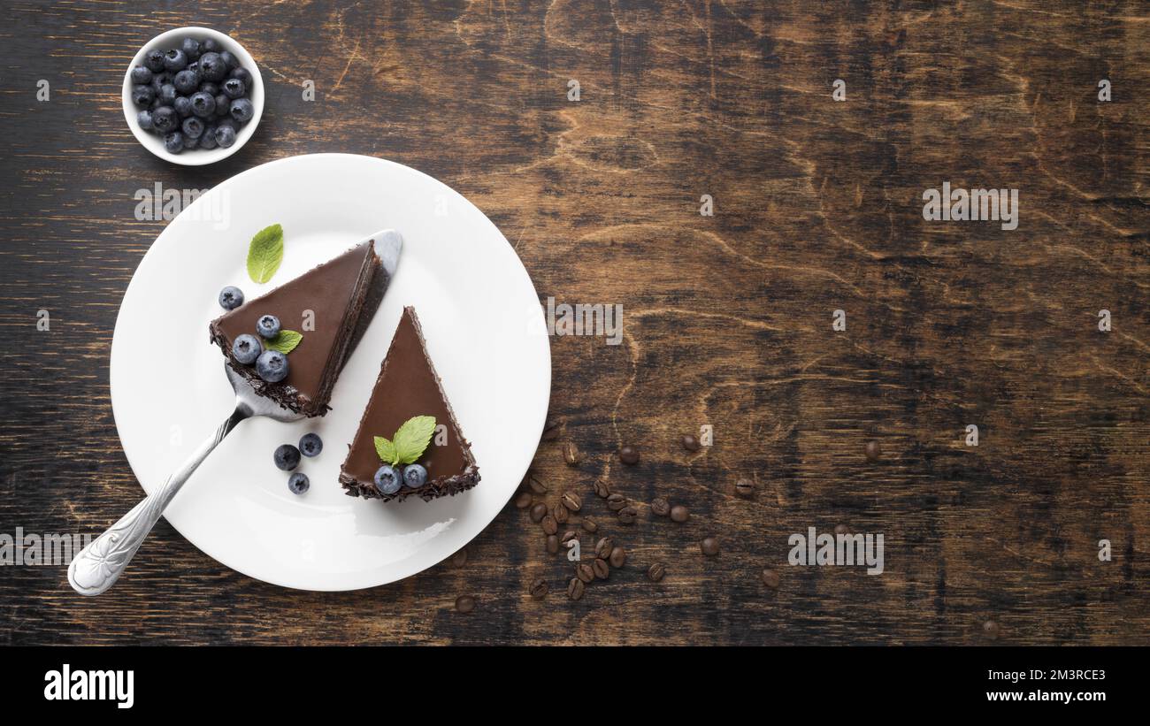 Top view chocolate cake slices plate with copy space. Resolution and ...