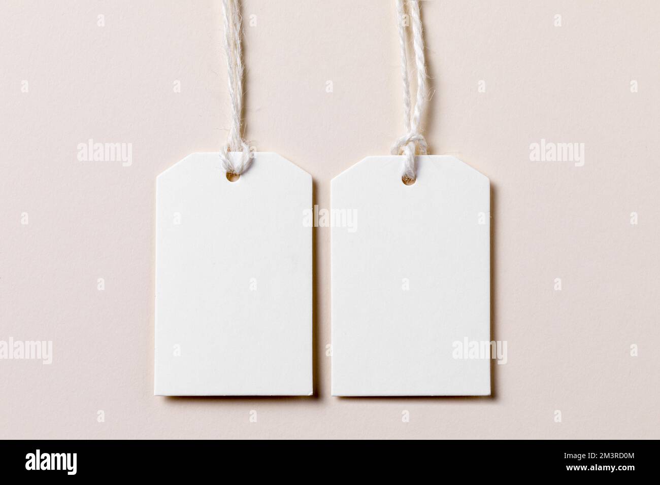 Top view empty labels arrangement beige background. Resolution and high ...