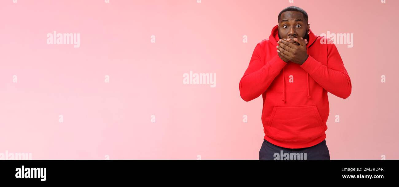 Shocked gasping surprised african-american guy overhear stunning rumour ...