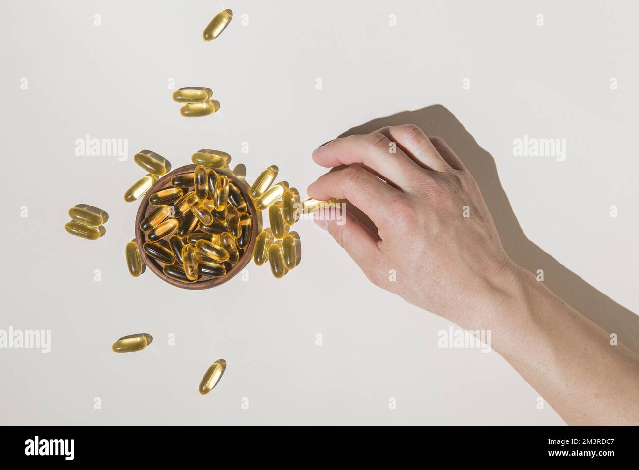 Top view hand picking medical capsules. Resolution and high quality ...