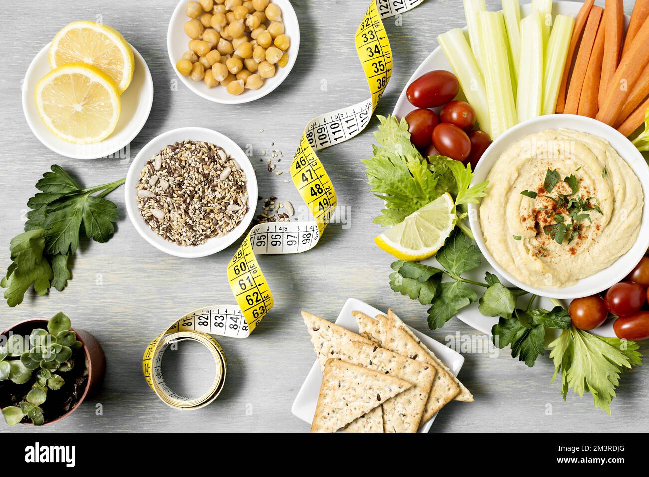 Top view hummus with assortment vegetables measuring tape. Resolution ...