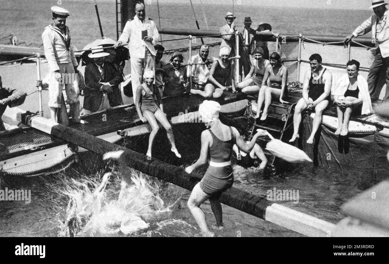 One of the combatants down in a spar boxing contest aboard the Blue ...