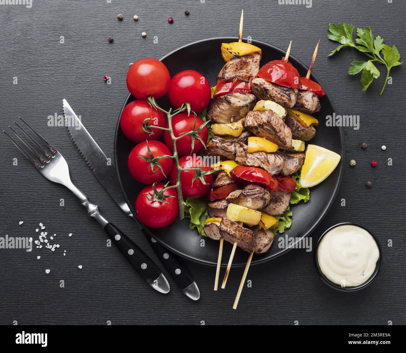 Top view plate with delicious kebab tomatoes. Resolution and high ...