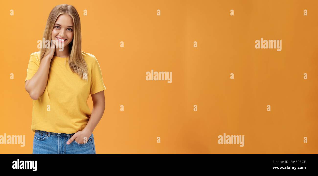 Portrait of shy and timid feminine girl with tan and straight fait hair ...