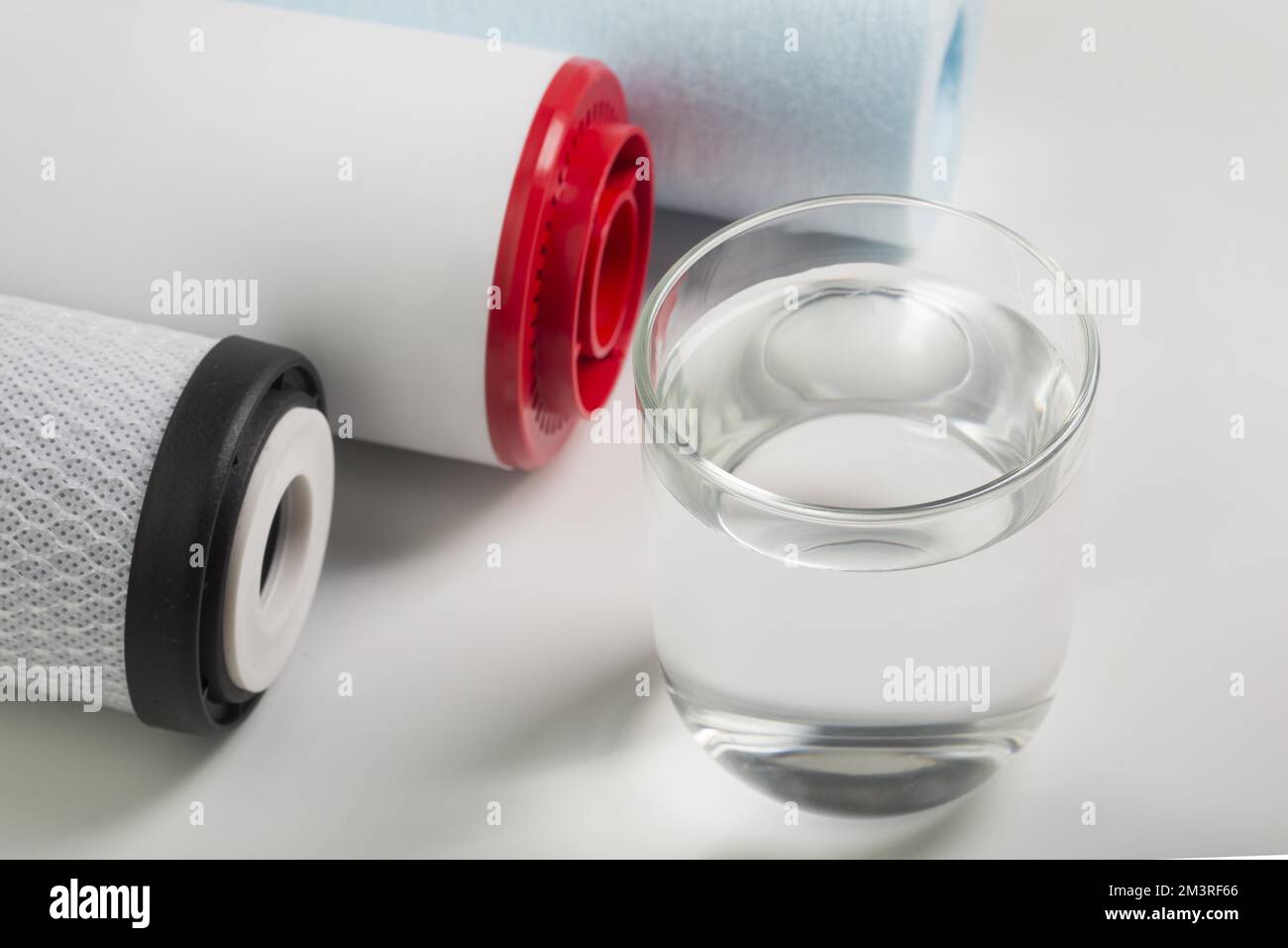 Water filters and glass of water white background. Resolution and high ...