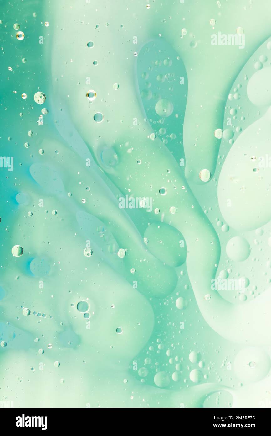 Water bubbles with abstract green background. Resolution and high ...