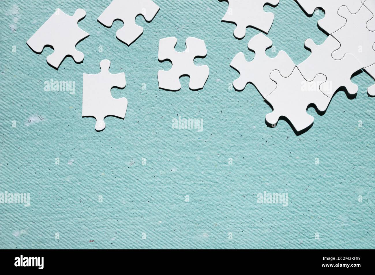 White jigsaw puzzle piece blue textured surface. Resolution and high ...