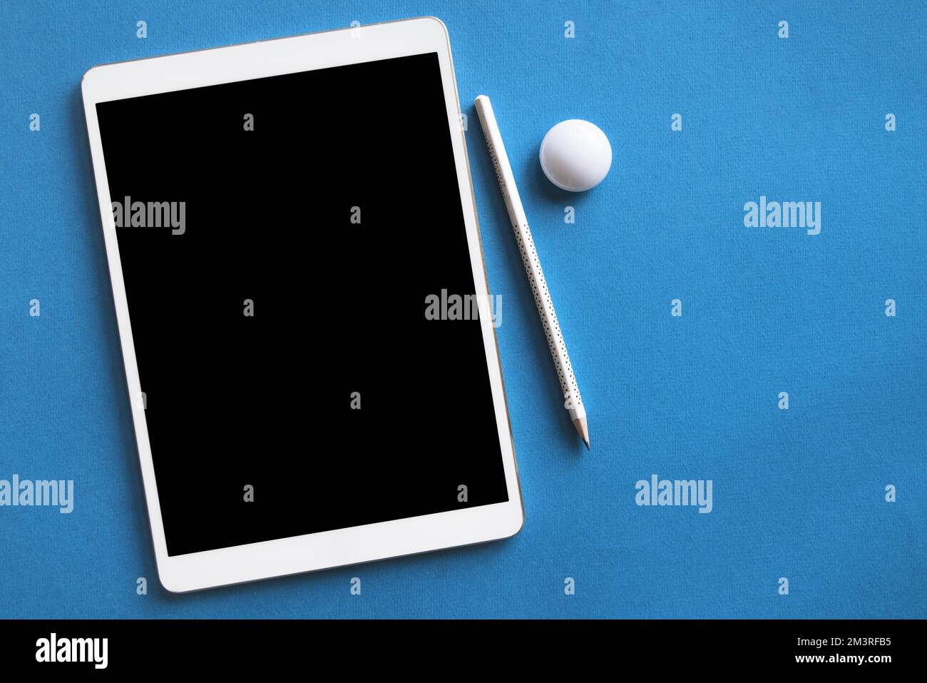 White tablet pencil blue surface. Resolution and high quality beautiful ...