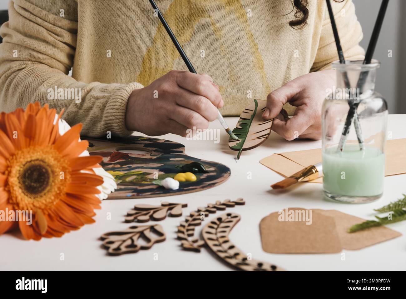 Wooden art pieces painting process. Resolution and high quality ...