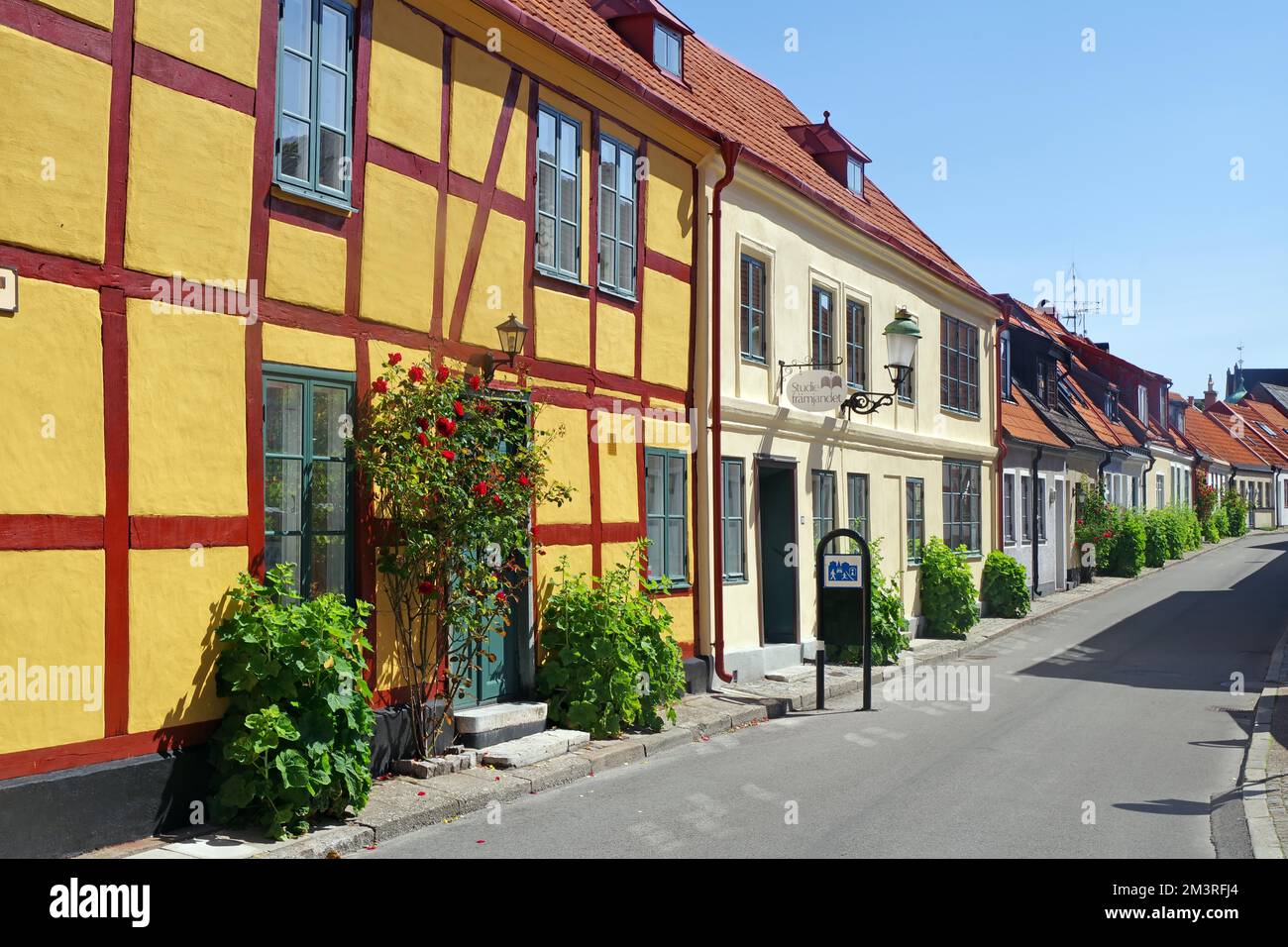 Narrow residential street with cosy houses, half-timbered ...