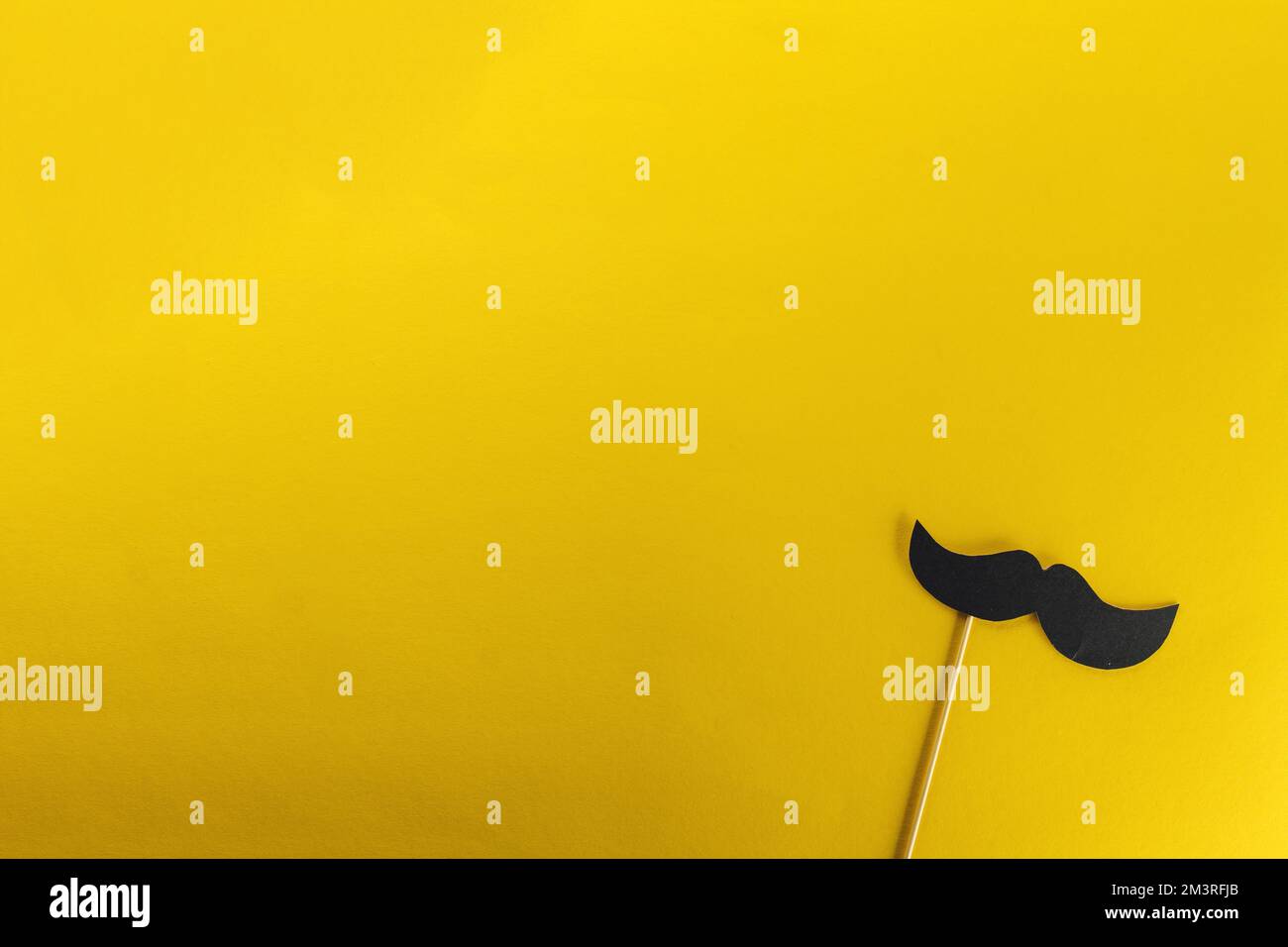 Yellow background with decorative fake mustache. Resolution and high ...