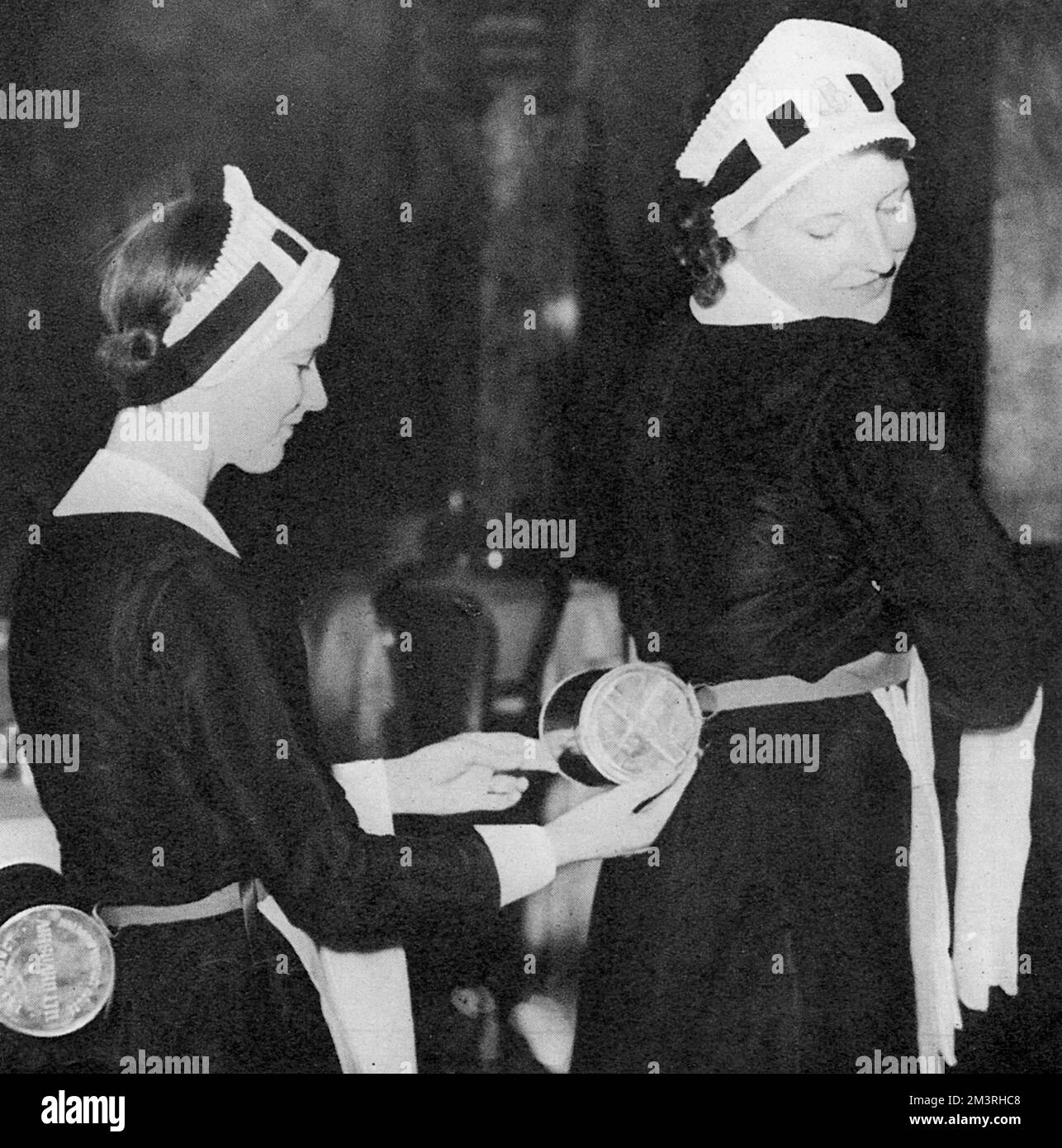 Two waitresses Black and White Stock Photos & Images - Alamy