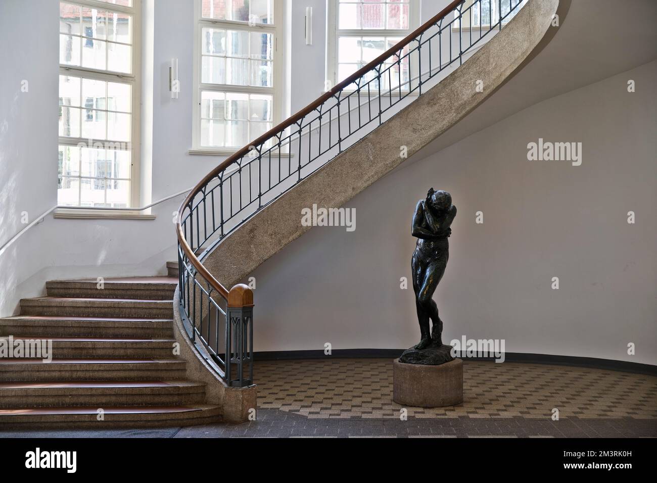 Foyer with free-swinging Art Nouveau staircase and Auguste Rodin's Eva ...