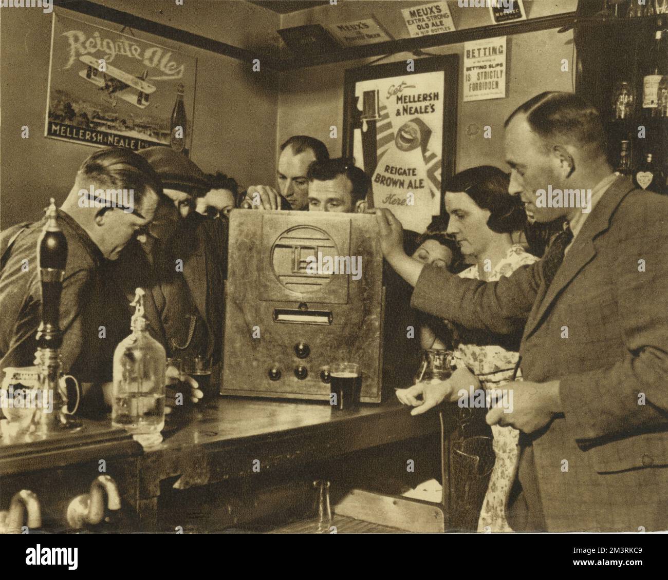 Gathered around radio hi-res stock photography and images - Alamy