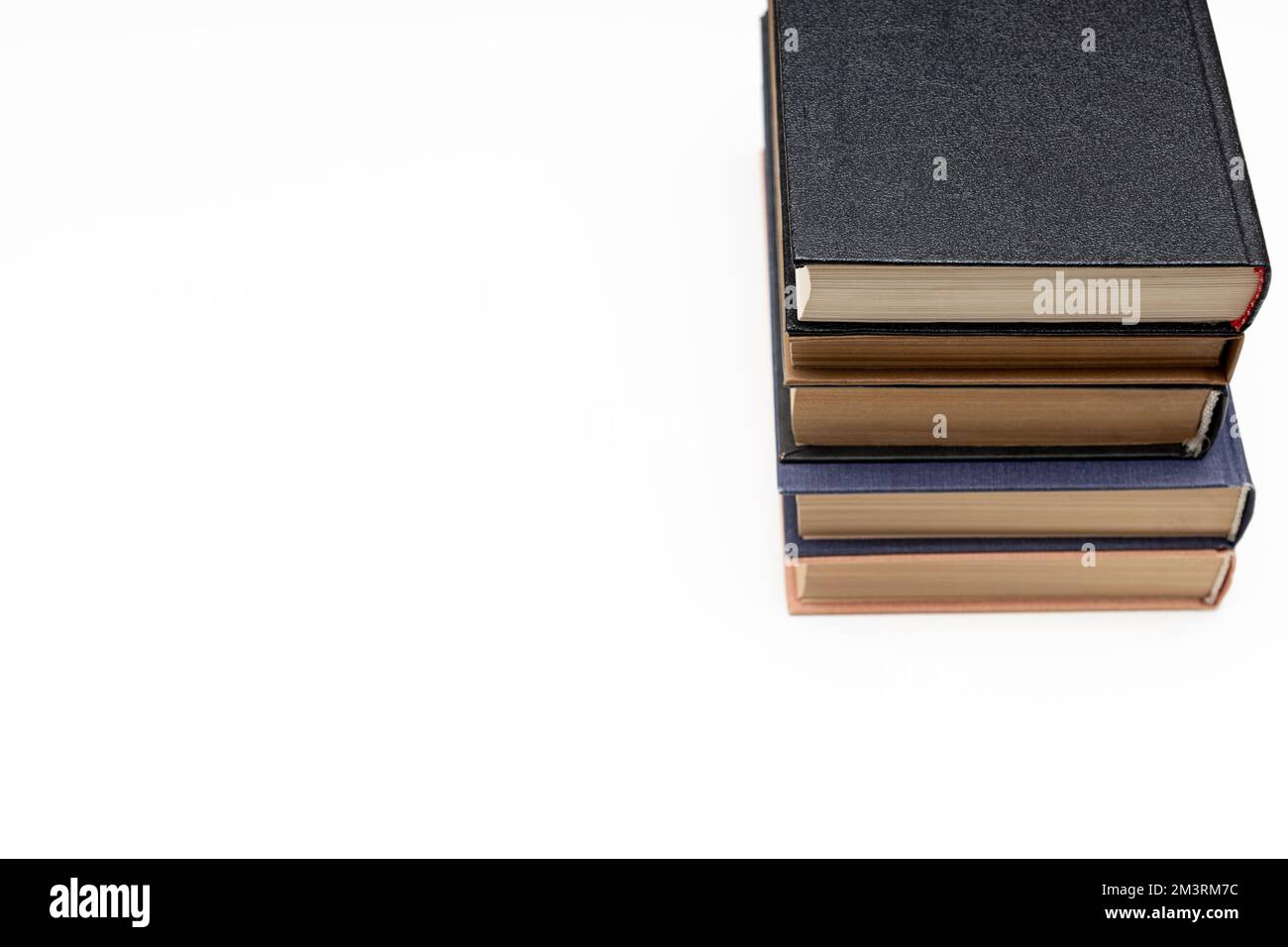 a stack of old books lies on the table. Old book. yellow book page ...