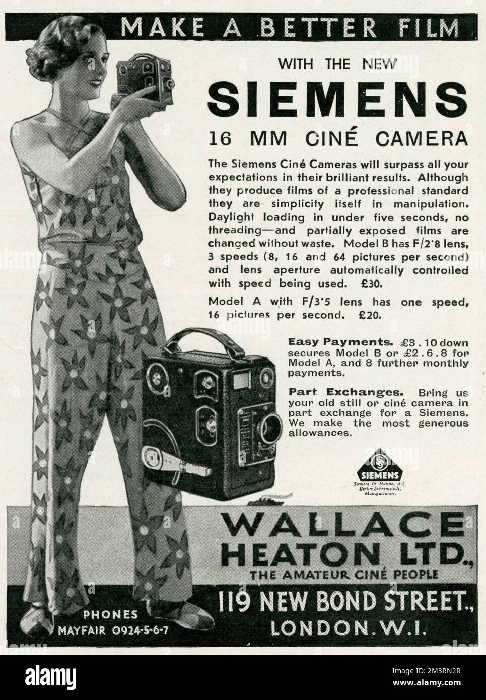 Woman holding a portable 'Siemens Cine Camera'. 1933 Stock Photo - Alamy