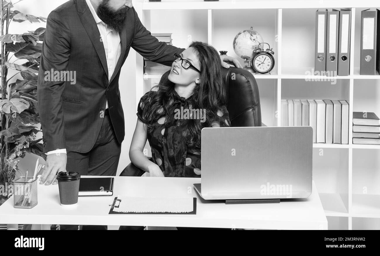 Office manager look at director crop view working on laptop, secretary ...