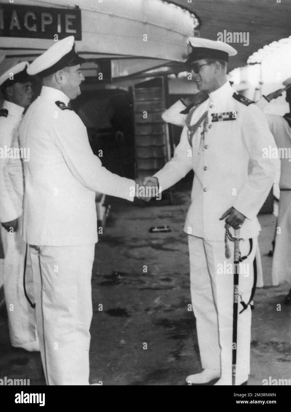 Prince Philip, Duke of Edinburgh, being met by Lt.-Cmdr A. Harber (sp ...