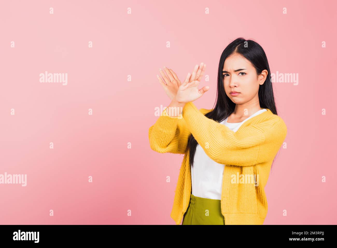 woman unhappy or confident standing wear holding two cross arms say no ...