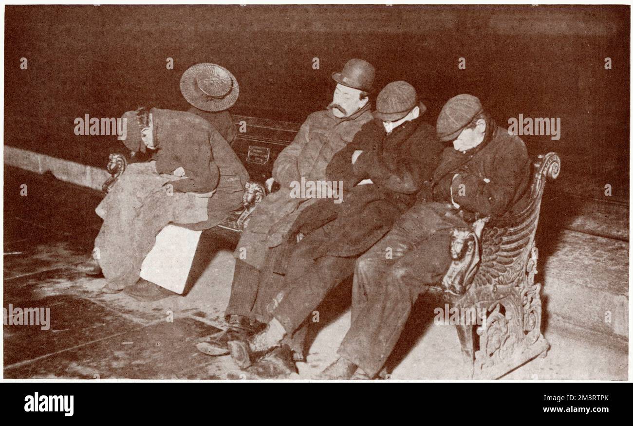 Homeless men trying to snatch a few brief hours of sleep on a cold ...