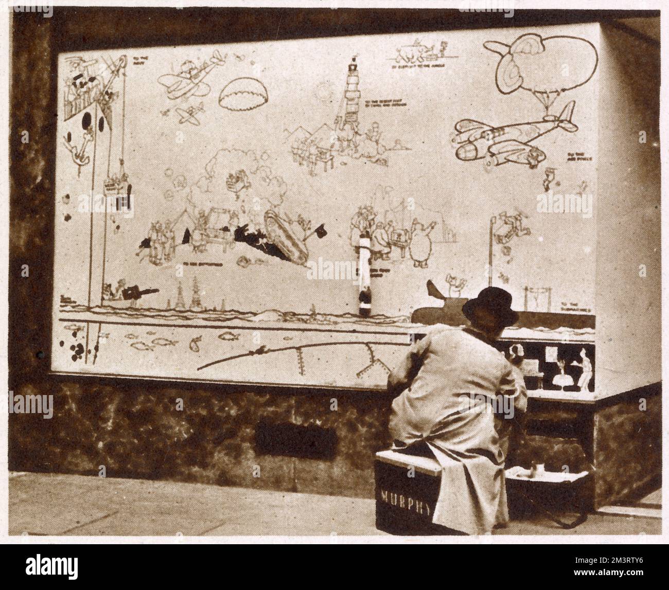 Norman Keene replicates Heath Robinson pics on shop windows Stock Photo ...