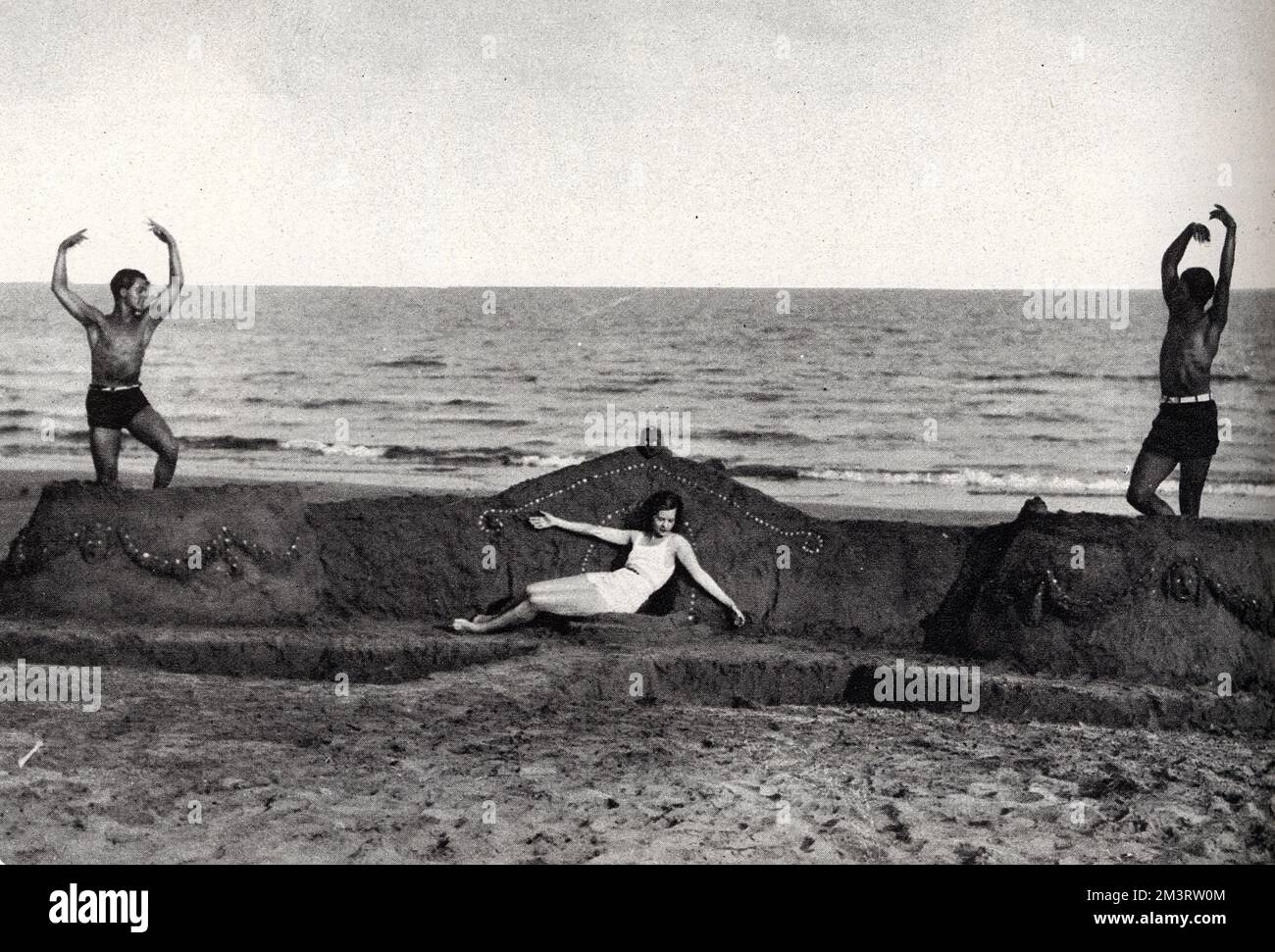 Oliver Messel, Mme Lelong and Serge Lifar at Venice Lido Stock Photo ...