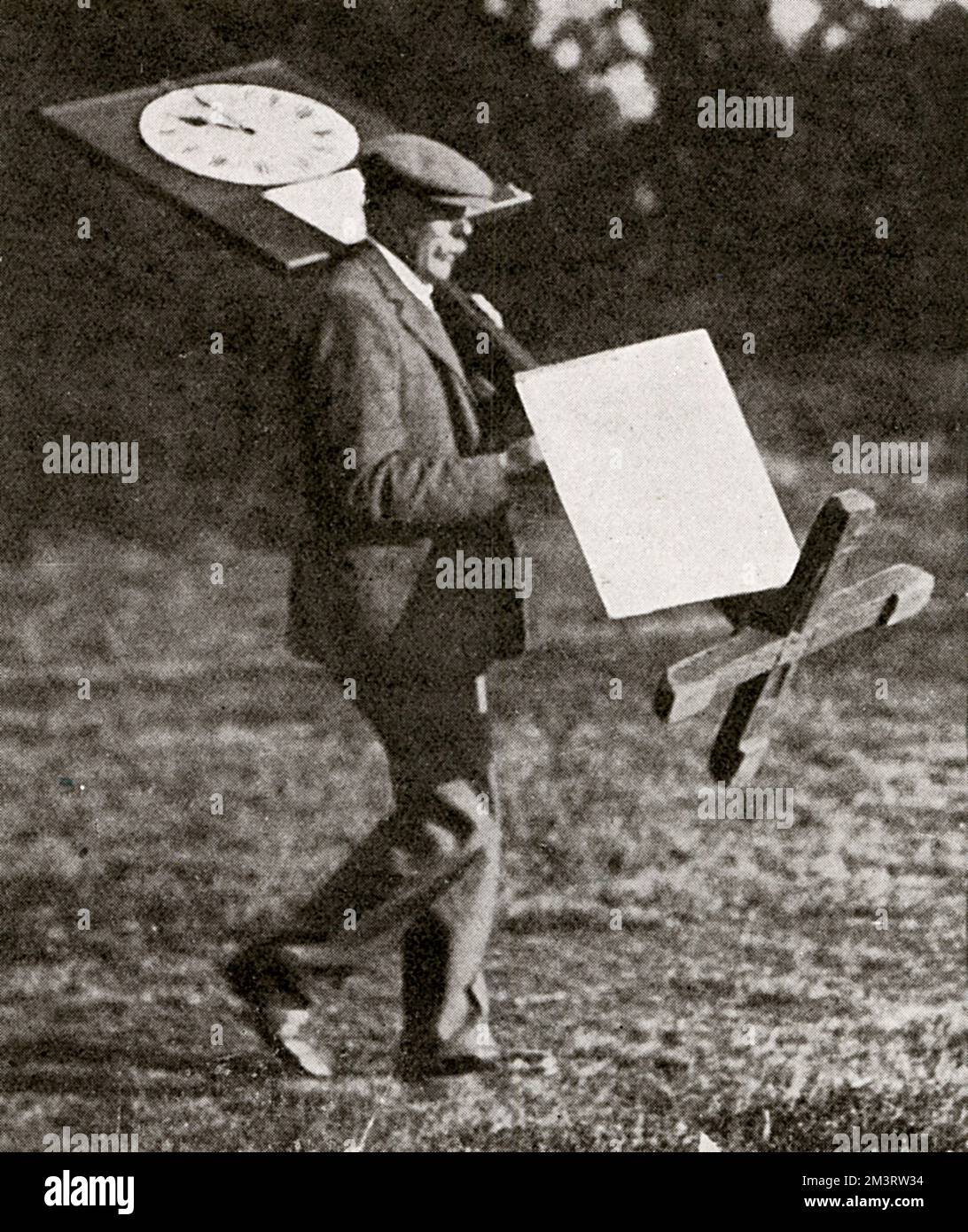 The hour and the man - James Braid carries starting clock Stock Photo ...