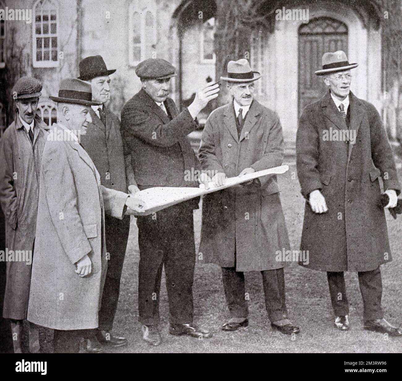 Golfer James Braid and others discussing the new plans for the new golf ...