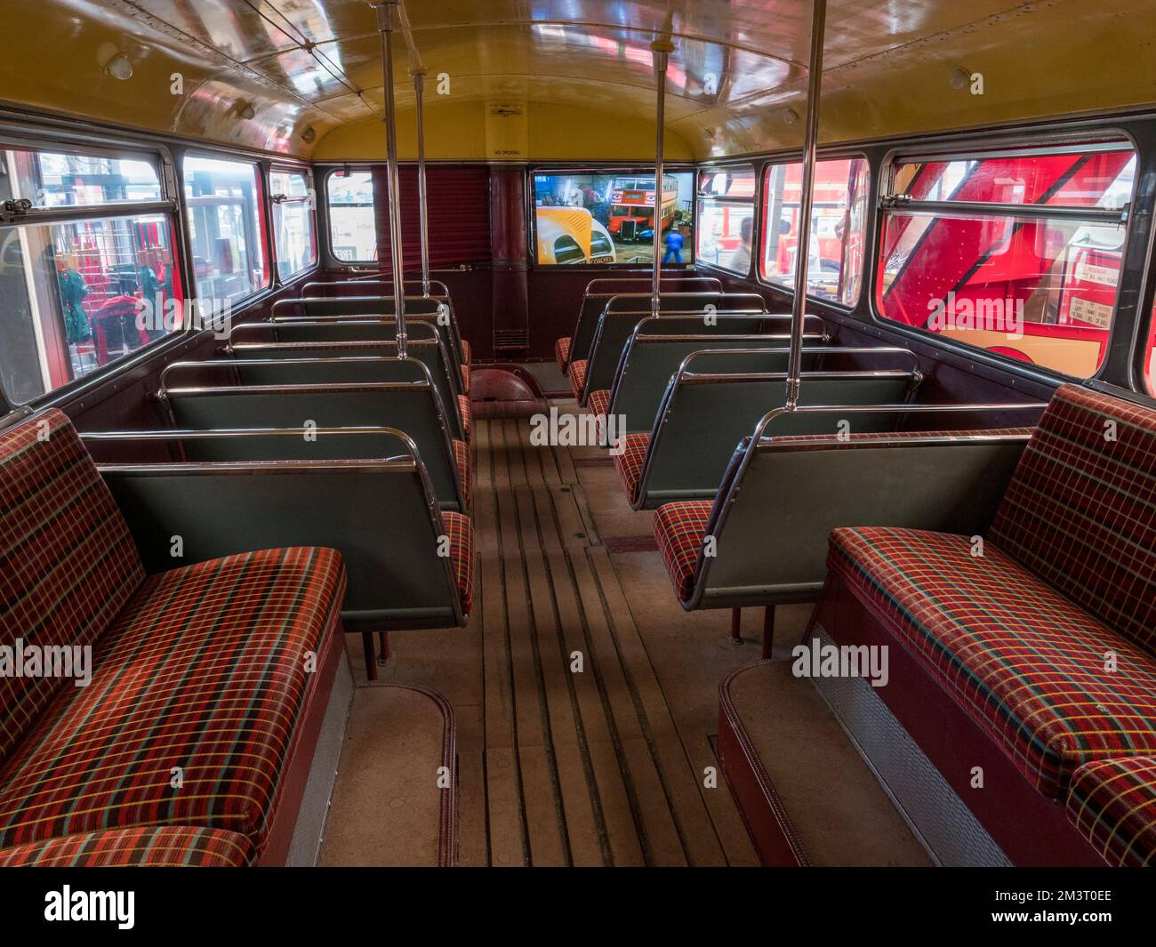 The lower deck inside a London Transport Routemaster bus in the London ...