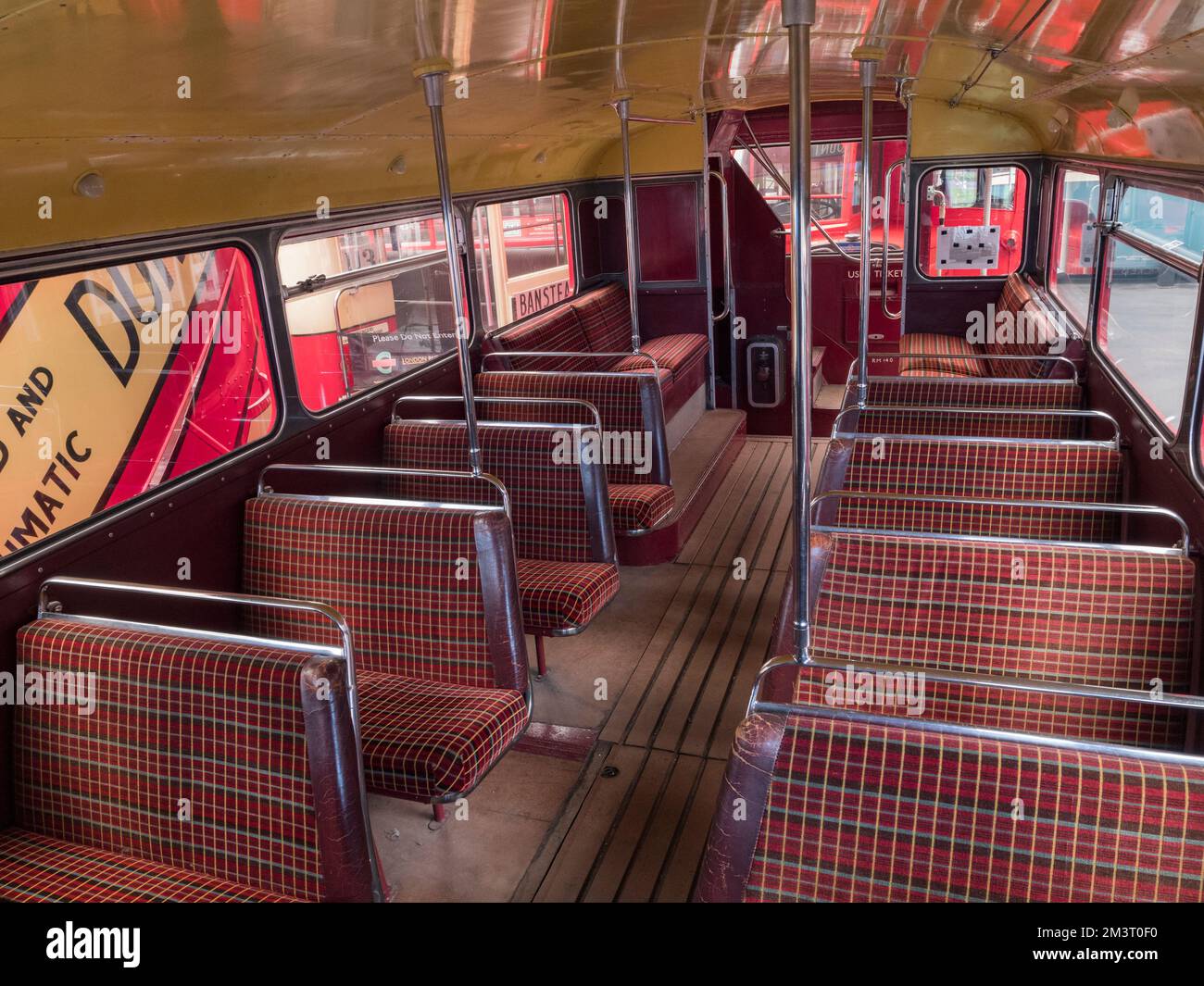The lower deck inside a London Transport Routemaster bus in the London ...