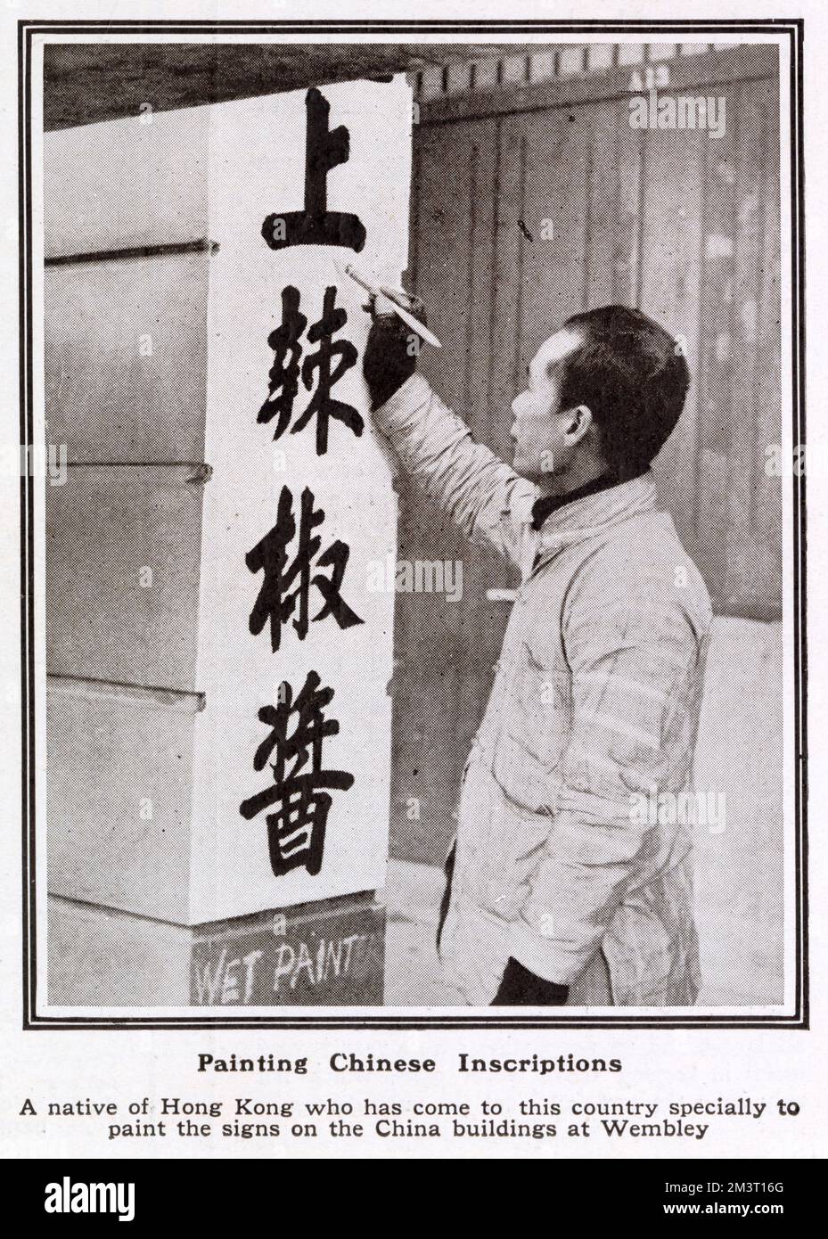 Sign writer from Hong Kong who had travelled especially to paint signs ...