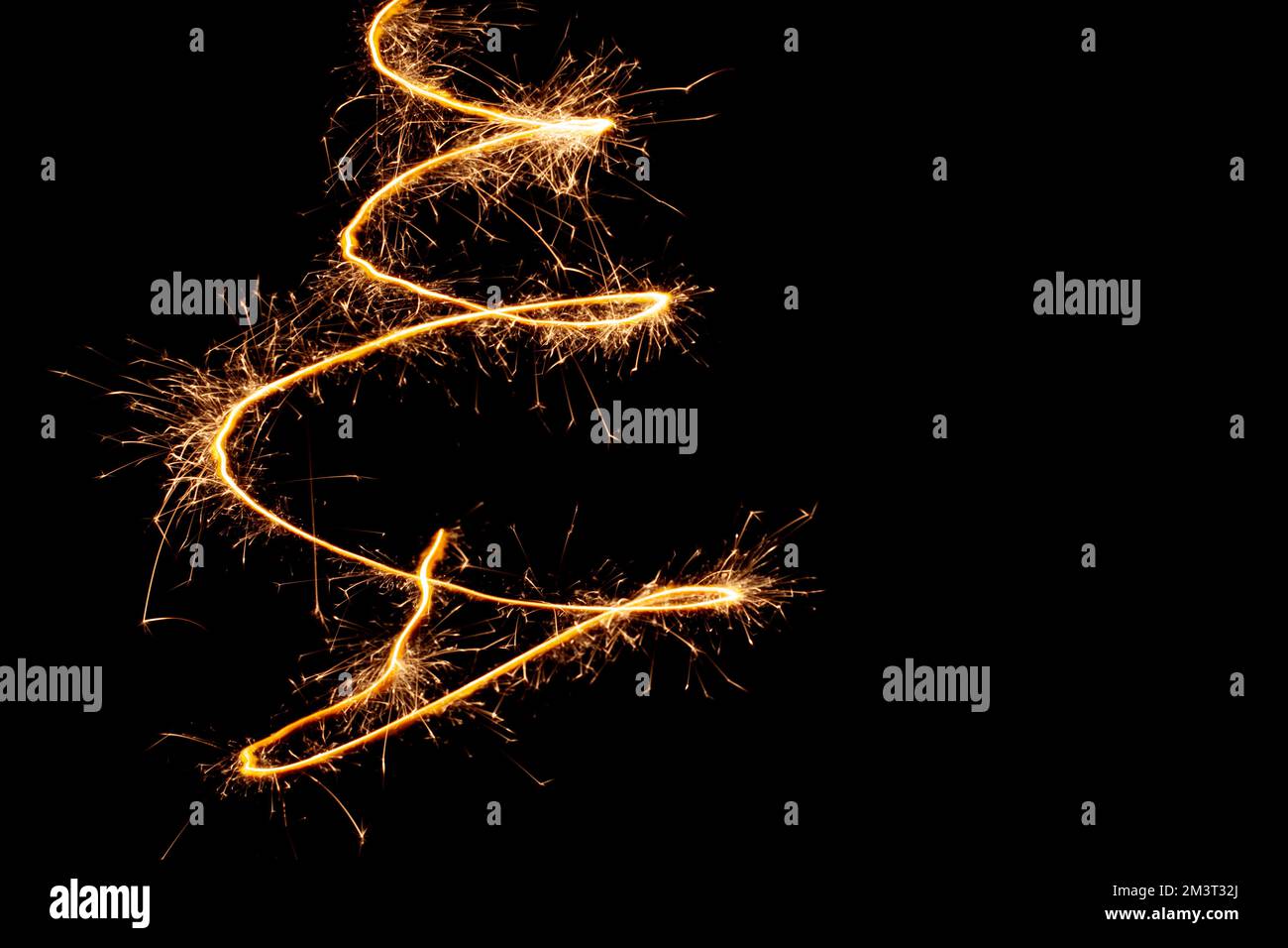 Sparks and lines of Bengal fireworks on a black background Stock Photo ...