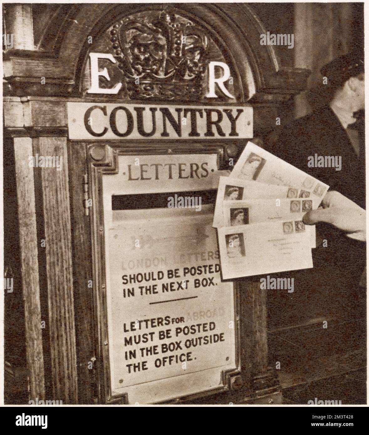 First letters bearing stamps of new reign Stock Photo - Alamy