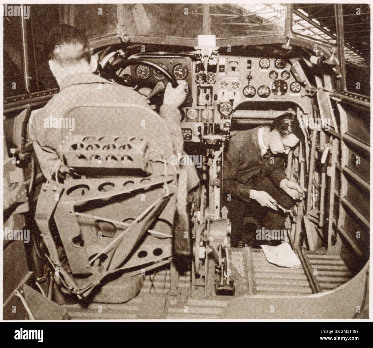 Carrying out tests in a finished Whitley bomber at Armstrong Whitworth ...