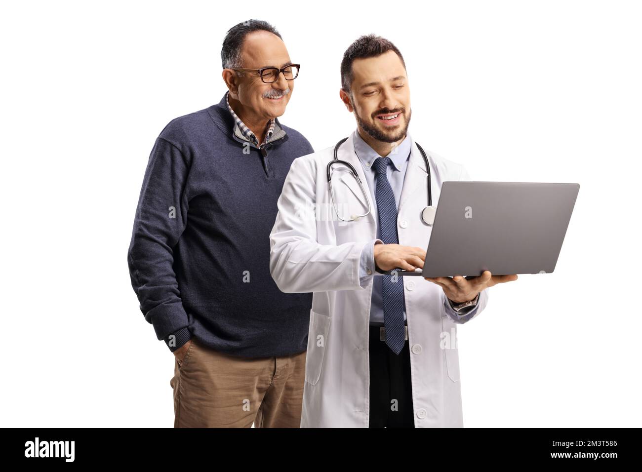 Male doctor and a patient disussing and looking at a laptop computer ...