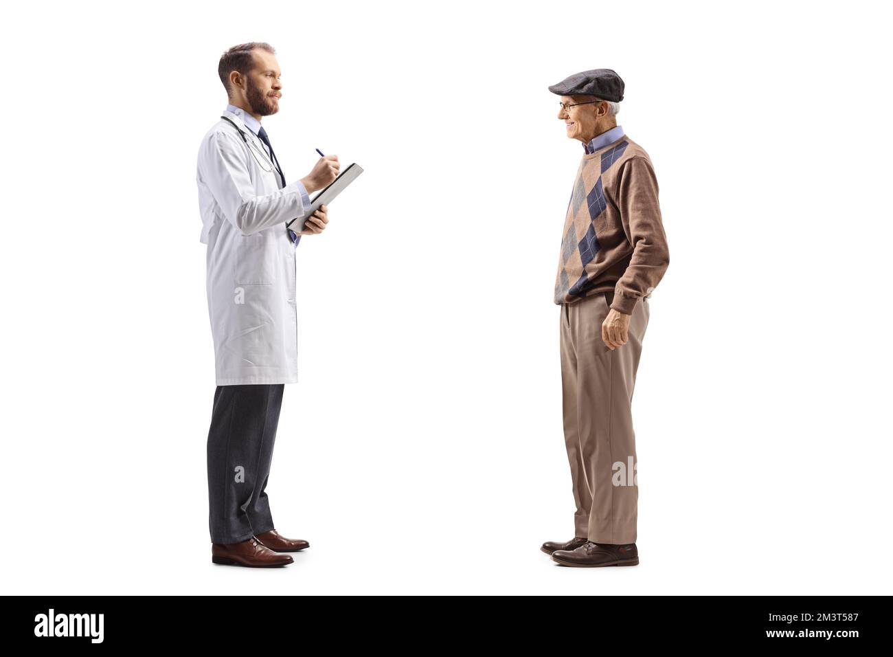 Full length profile shot of a doctor writing a document and standing ...