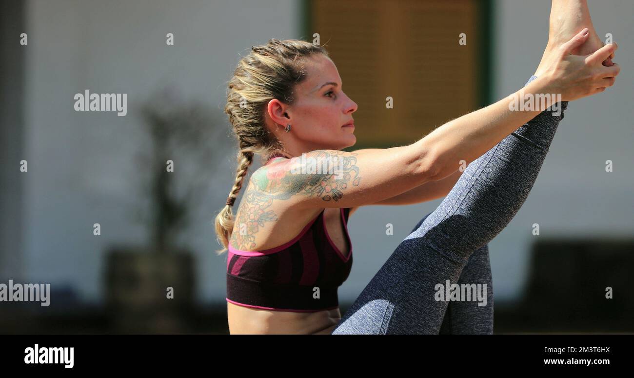 Yogi fit woman training Yoga strength asana pose Stock Photo - Alamy