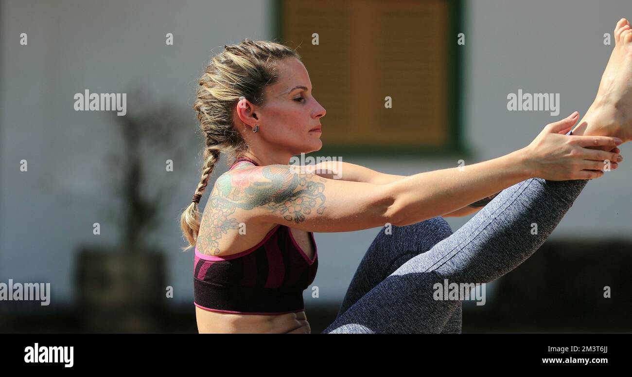 Yogi fit woman training Yoga strength asana pose Stock Photo - Alamy